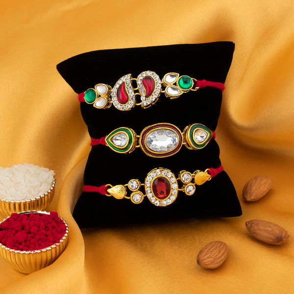 Sukkhi Elegant Gold Plated Austrian Diamond Rakhi Combo (Set of 3) wit ...