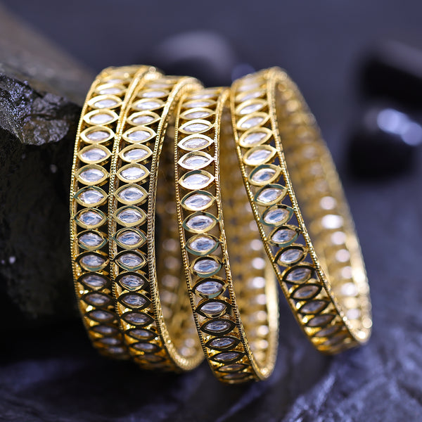 Sukkhi Zingy Golden Reversible Stone Gold Plated Traditional Set Of 4 ...
